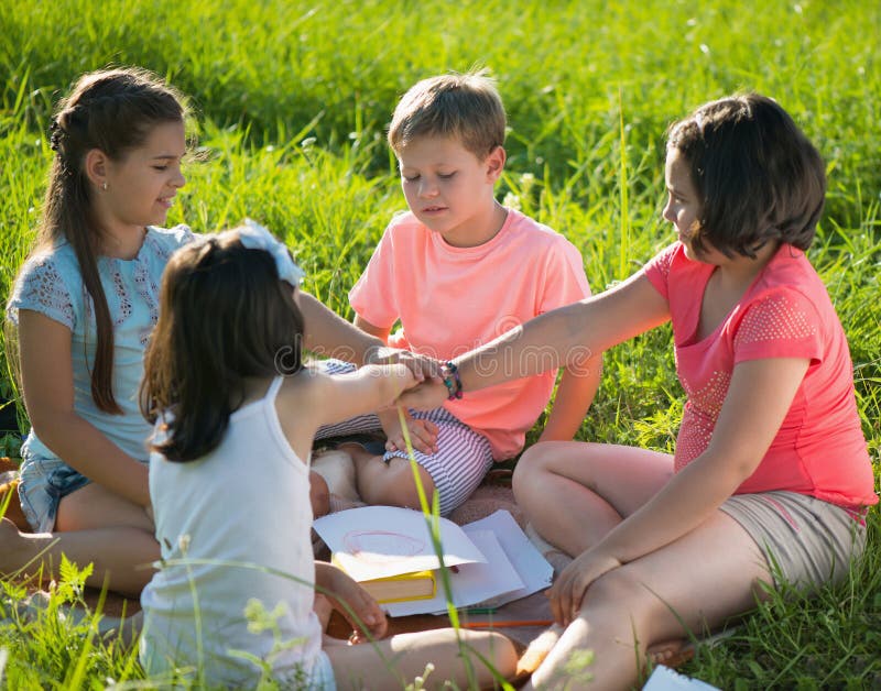 Group of Children Playing on Grass Stock Photo - Image of colorful ...