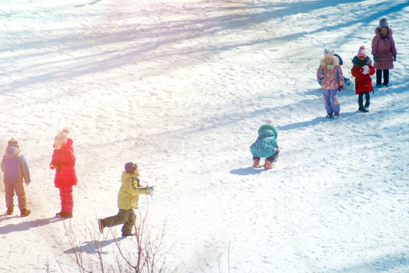 Group of Children Playing on Snow in Winter Time Editorial Image ...