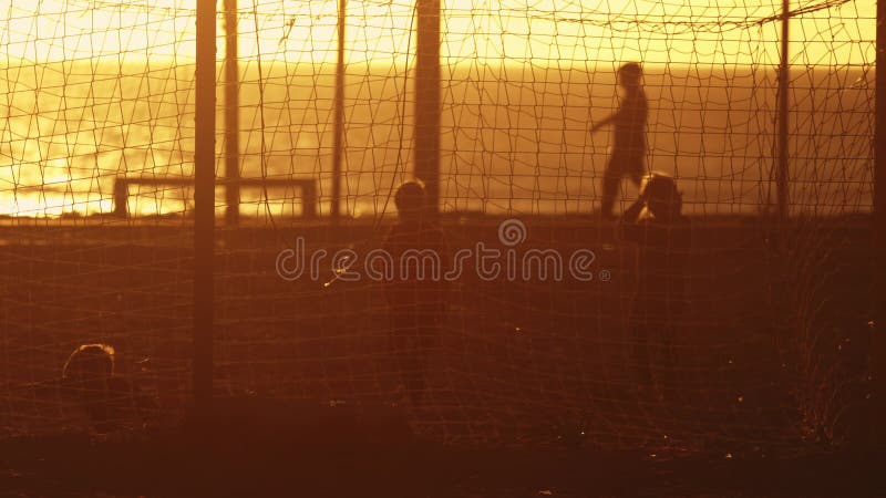 A Dynamic Game of Soccer at Sunset Stock Video - Video of sunset ...