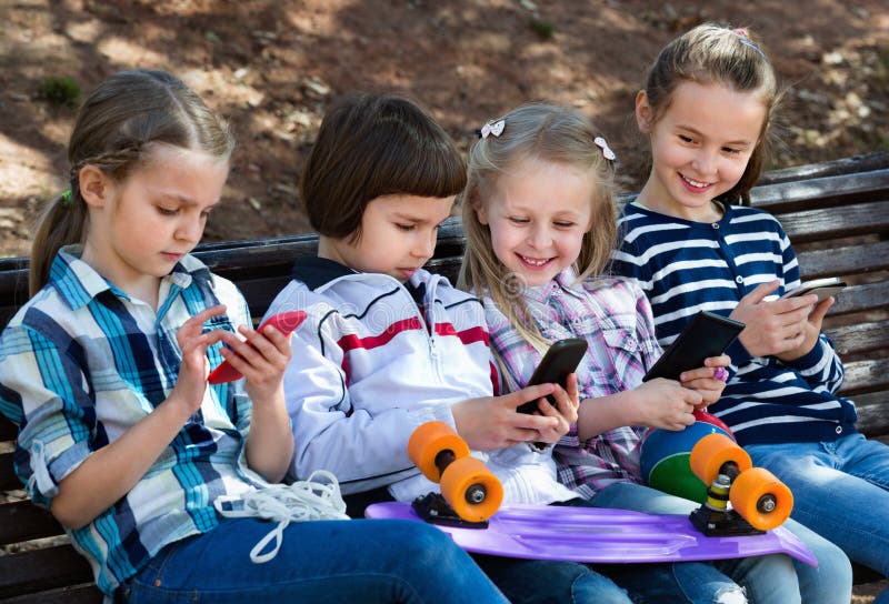 Group of Children Posing with Mobile Devices Stock Image - Image of ...