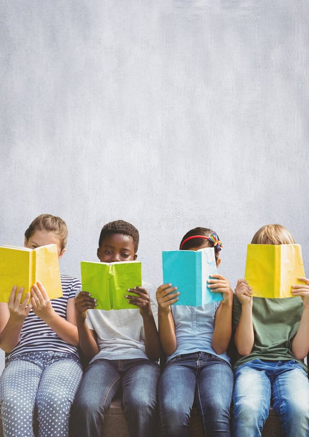 Group of Children Sitting and Reading in Front of Grey Background Stock ...