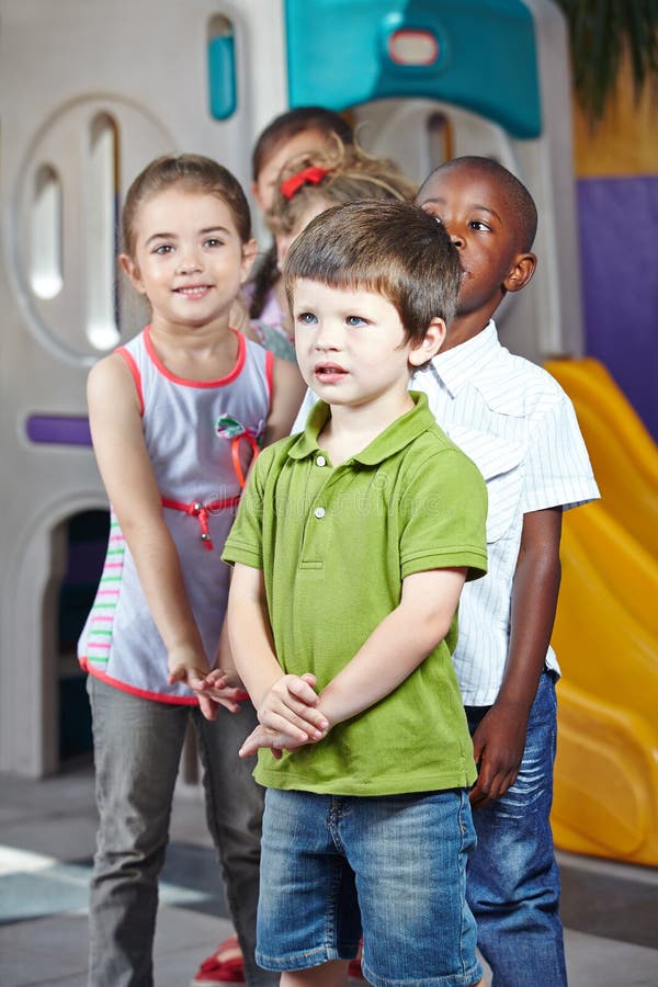 Group of children in a row stock photo. Image of friendship - 39873094