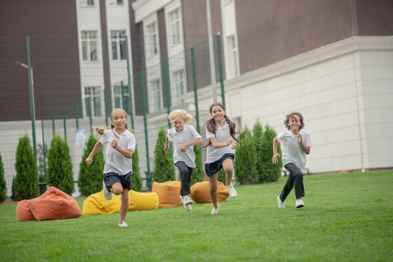 Group of Children Running and Looking Energized Stock Image - Image of ...