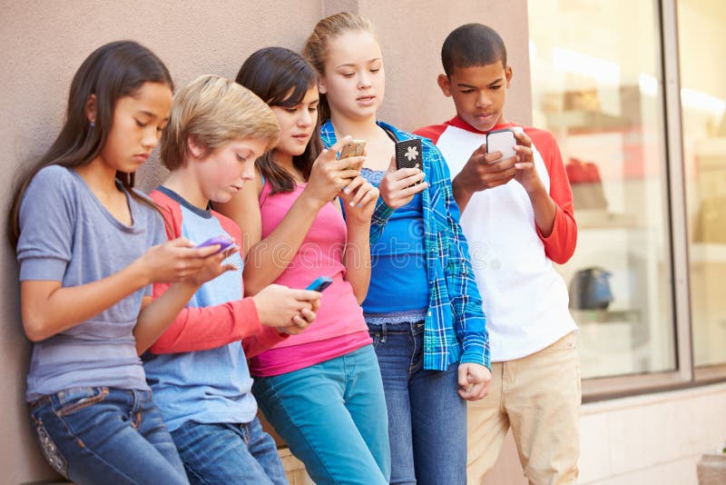 Group of Children Sitting in Mall Using Mobile Phones Stock Image ...