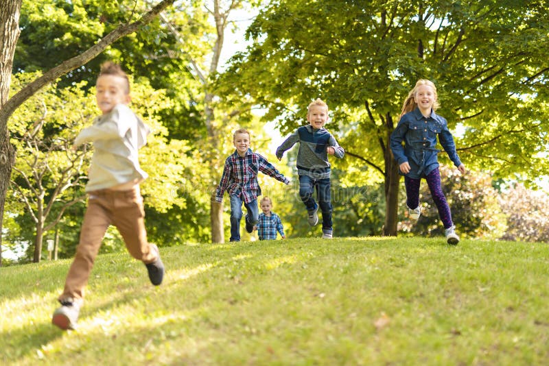 Children in spring field stock photo. Image of baby, spring - 22727942