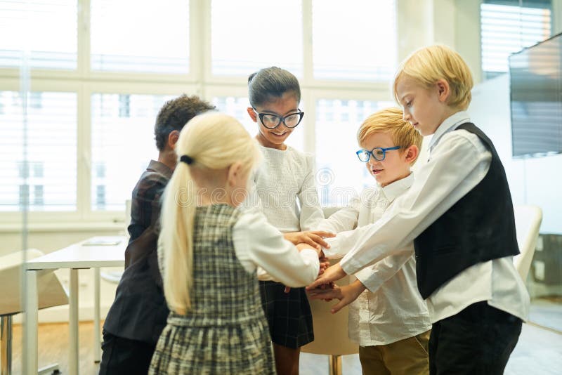 Group of Children Stand in Circle and Stack Hands Stock Image - Image ...