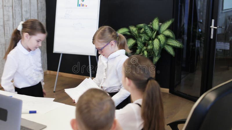 Children Businesspeople Working and Communicating in a Modern Office ...