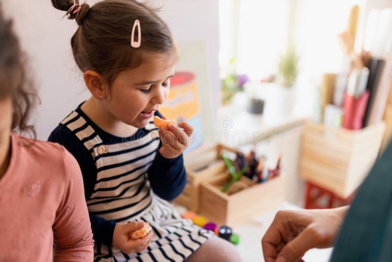 Group of Classmates Having Fruit Snack during Break at School. Stock ...