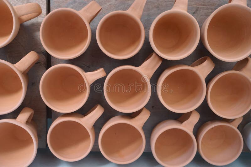 Group of clay cups stock image. Image of kitchen, bowl - 85750285