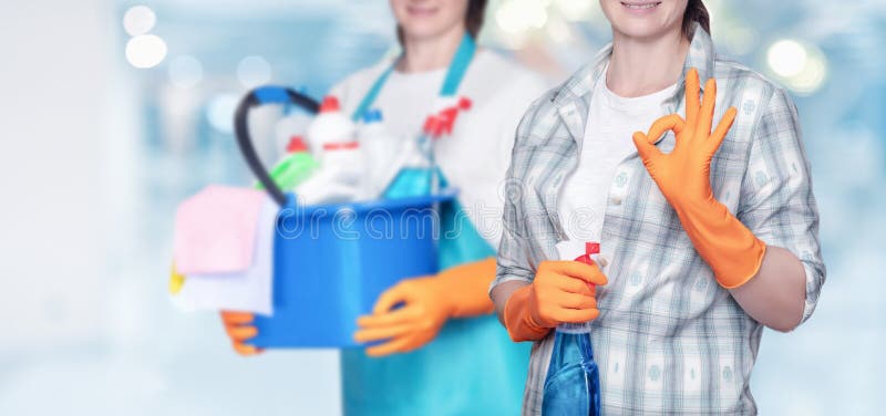 Group of Cleaning Ladies Stand on a Blurred Background Stock Image ...