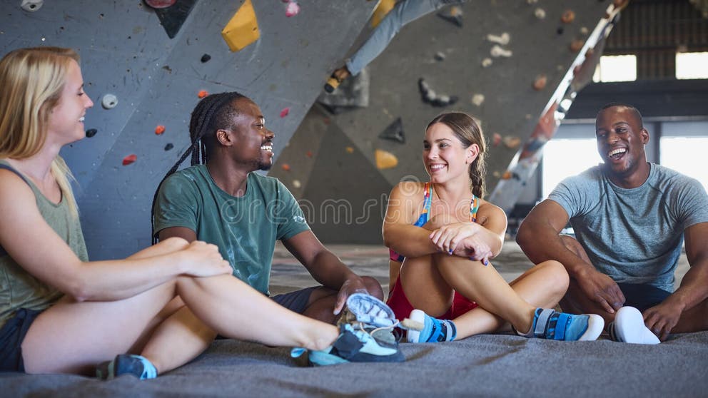 Group of Climbers and Instructors Taking a Break Sitting by Climbing ...
