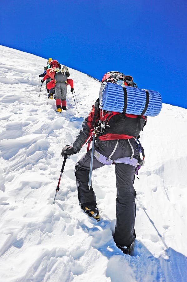 Group of Climbers Reaching the Summit Stock Photo - Image of everest ...