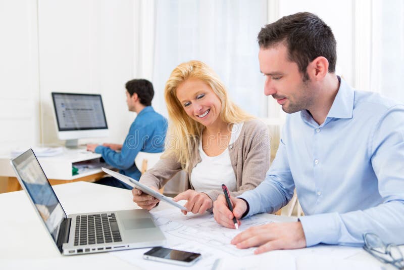 Group of Co Workers at the Office Stock Image - Image of team, tablet ...