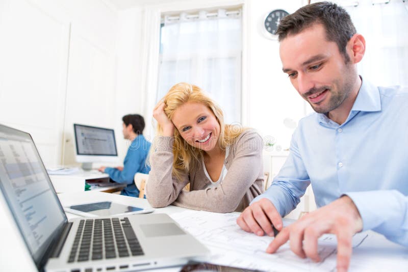 Group of Co Workers at the Office Stock Photo - Image of laptop, blond ...