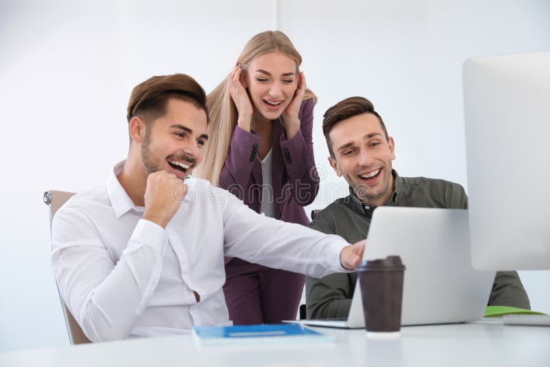 Group of Colleagues Using Video Chat on Computer in Office Stock Image ...