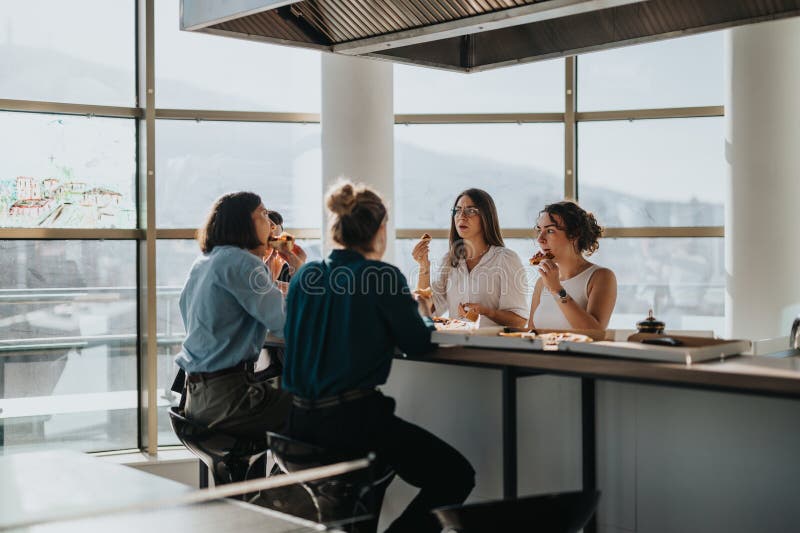 Colleagues Enjoy Lunch Break Together at the Modern Office Kitchen ...