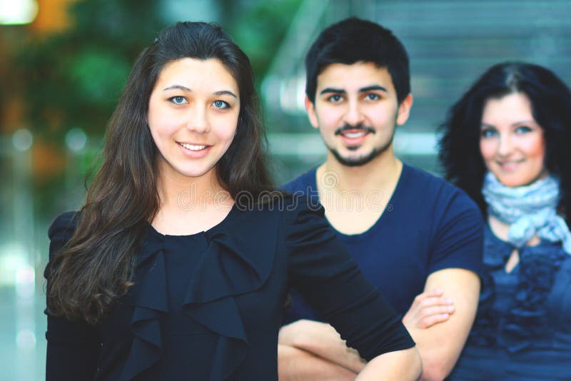 Group of College Students Smiling Standing Friendly To Each Other Stock ...