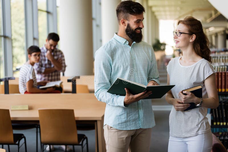 Group of College Students Studying at Library Stock Image - Image of ...