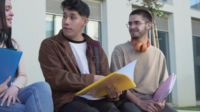 A Group of College Students Talk on the Campus of the University during ...