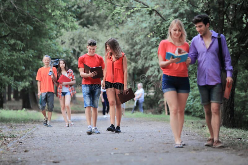 Group of College Students on a Walk in the Park Stock Image - Image of ...