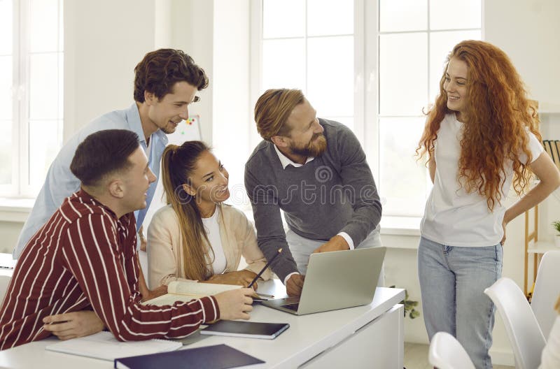 Group of College Students Working Together on an Educational Project ...