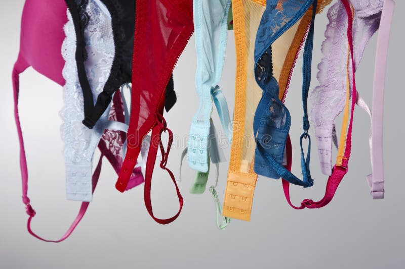 Numerous Colorful Bras are Hung on a Close Line in a Studio Environment ...