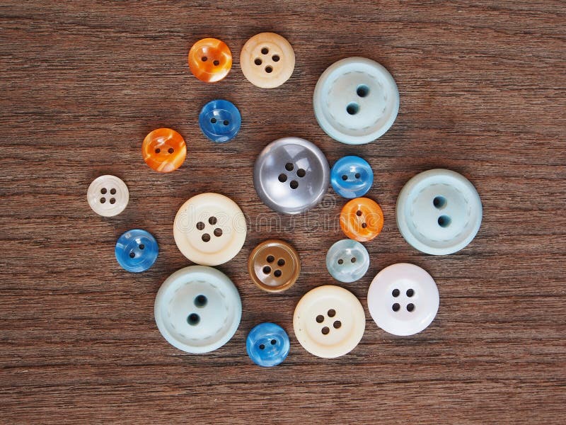 Group of Colorful Buttons on the Wooden Table Stock Image - Image of ...
