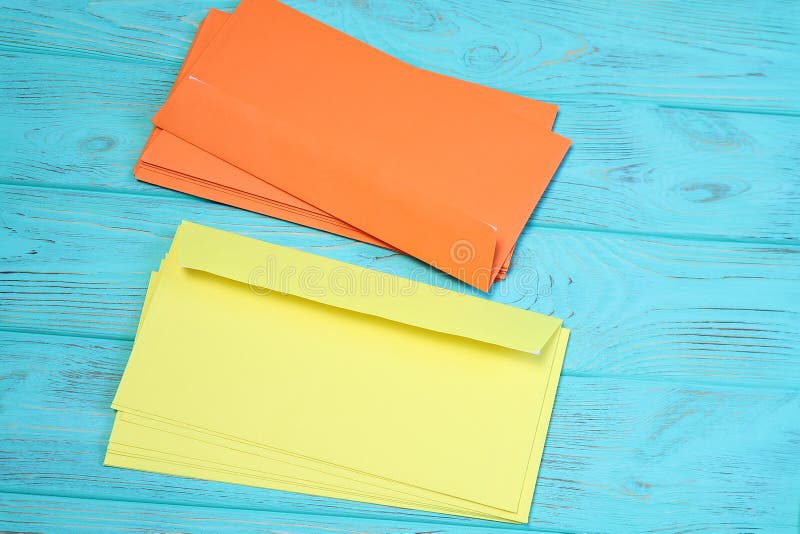 Group of Colorful Envelopes on Wooden Table, Mock Up Stock Photo ...