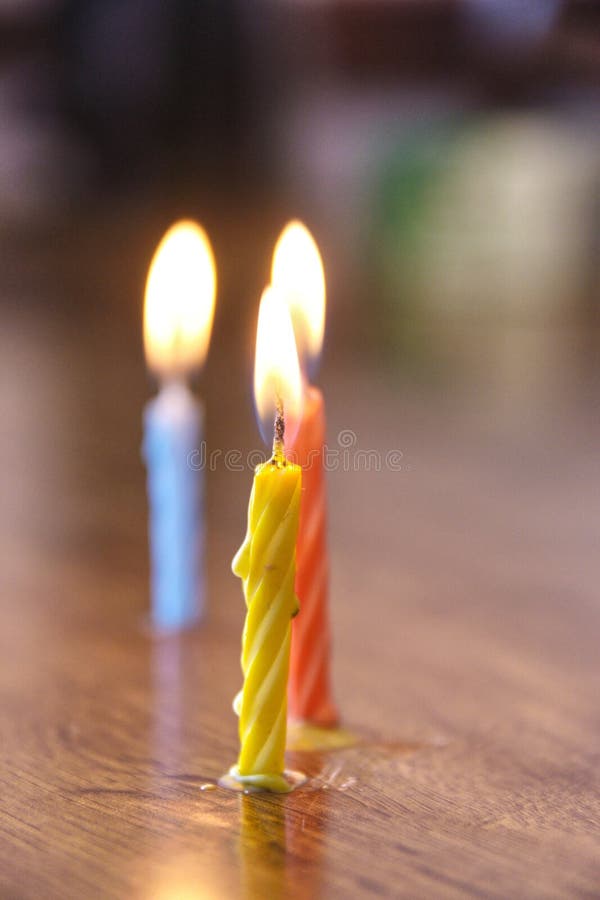 Group of Colorful Fire Candles on Table Stock Photo - Image of yellow ...