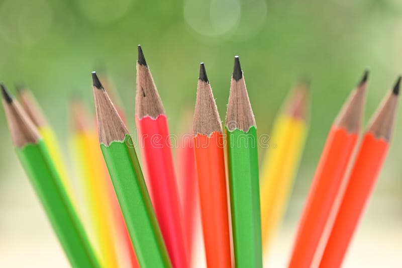 Group of Colourful Sharp Pencil on Blur Green Nature Background with ...