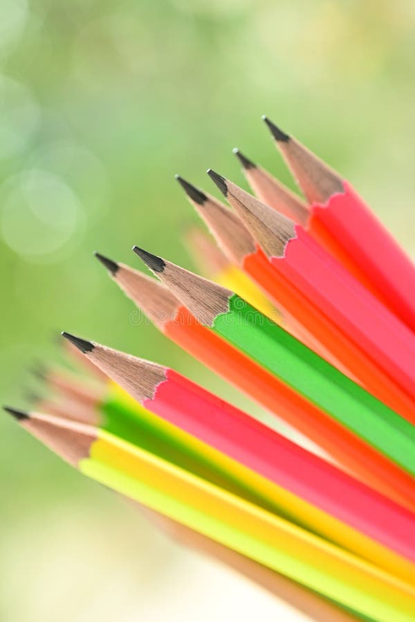 Group of Colourful Sharp Pencil on Blur Green Nature Background with ...