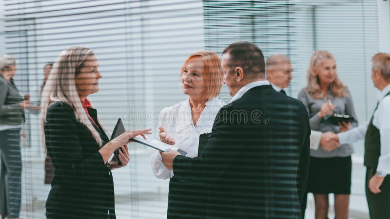 Group of Competent Employees Discussing Business Documents Stock Photo ...