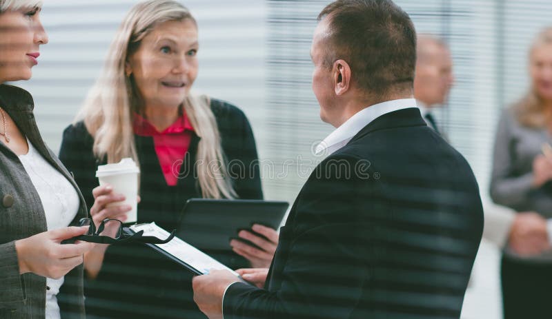 Group of Competent Employees Discussing Business Documents Stock Photo ...