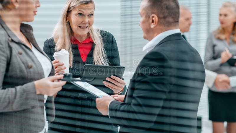 Group of Competent Employees Discussing Business Documents Stock Photo ...