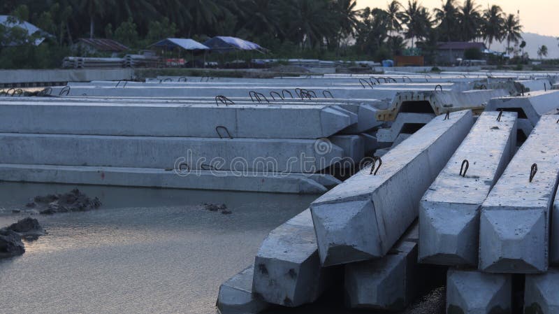 A Group of Concrete Blocks are on the Water Stock Image - Image of blue ...