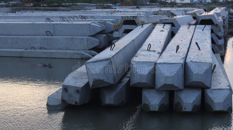 A Group of Concrete Blocks are on the Water Stock Photo - Image of roof ...