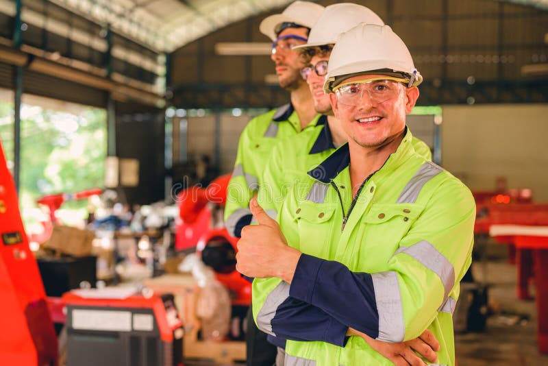 Group of Confident Engineers Workers Smiling Stock Image - Image of ...