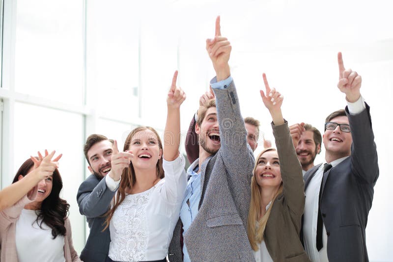 Group of Confident Young People, Pointing Somewhere Up. Stock Photo ...