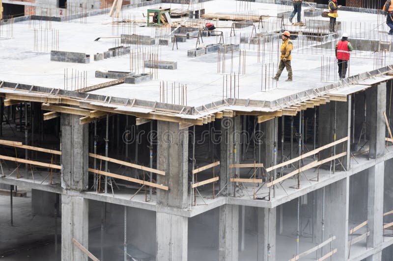 Group of Construction Engineer Team in Standard Safety Uniform Work ...