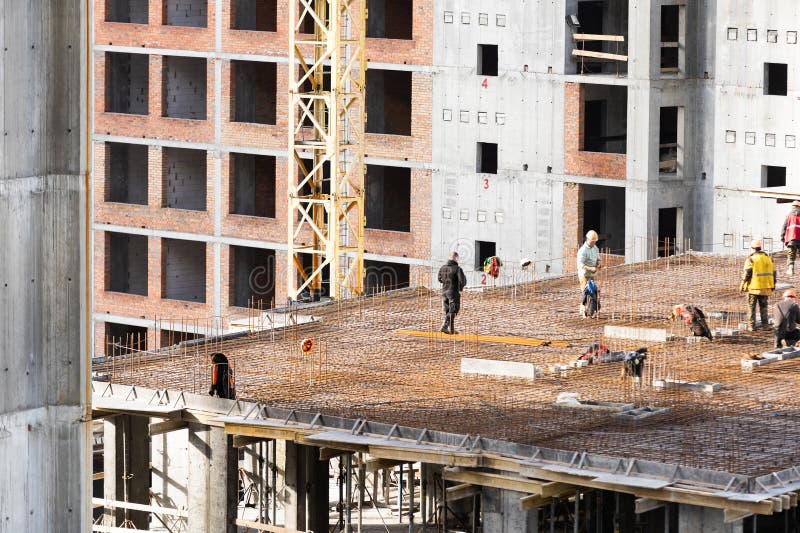 Group of Construction Engineer Team in Standard Safety Uniform Work ...