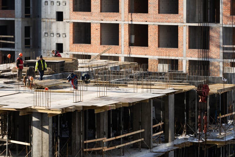 Group of Construction Engineer Team in Standard Safety Uniform Work ...