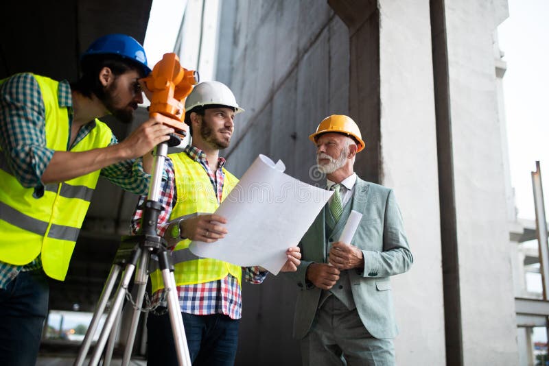 Group of Construction Engineer Working in Construction Site Stock Photo ...