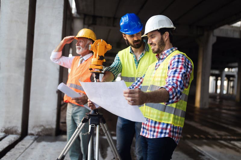 Group of Construction Engineer Working in Construction Site Stock Photo ...