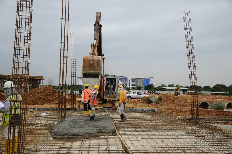 Construction Workers Stacking the Maintain Load Test Block Also Known ...