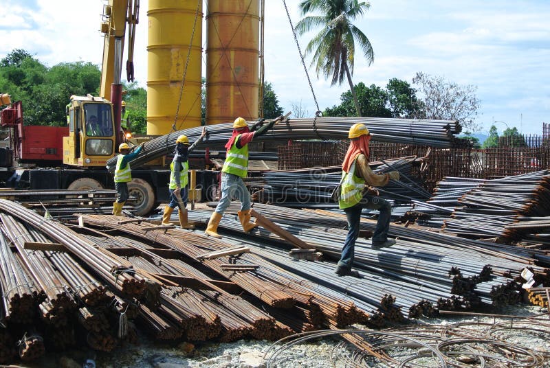 Group Construction Workers Lifting Bundle Reinforcement Bar Using Crane ...