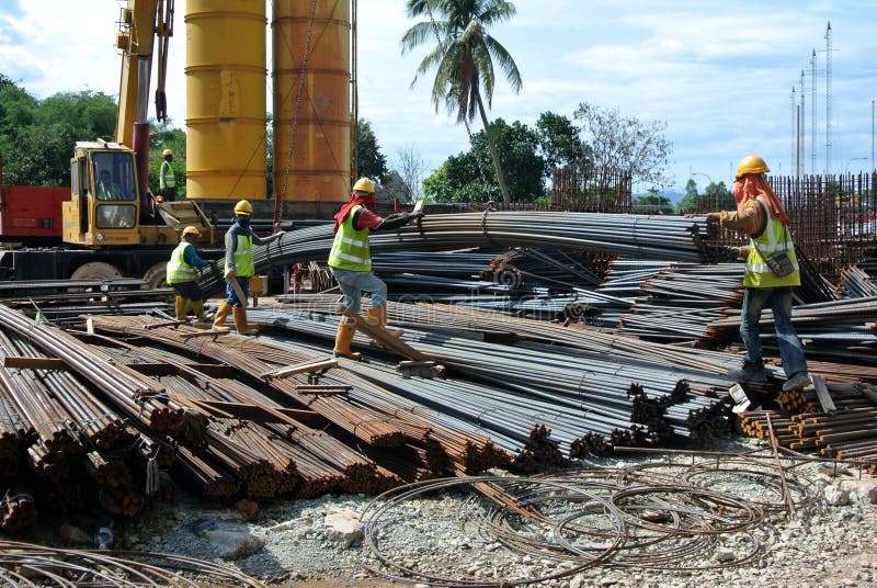Group Construction Workers Lifting Bundle Reinforcement Bar Using Crane ...