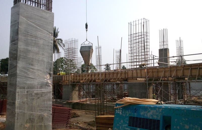 Group of Construction Workers Pouring Wet Concrete Using the Concrete ...