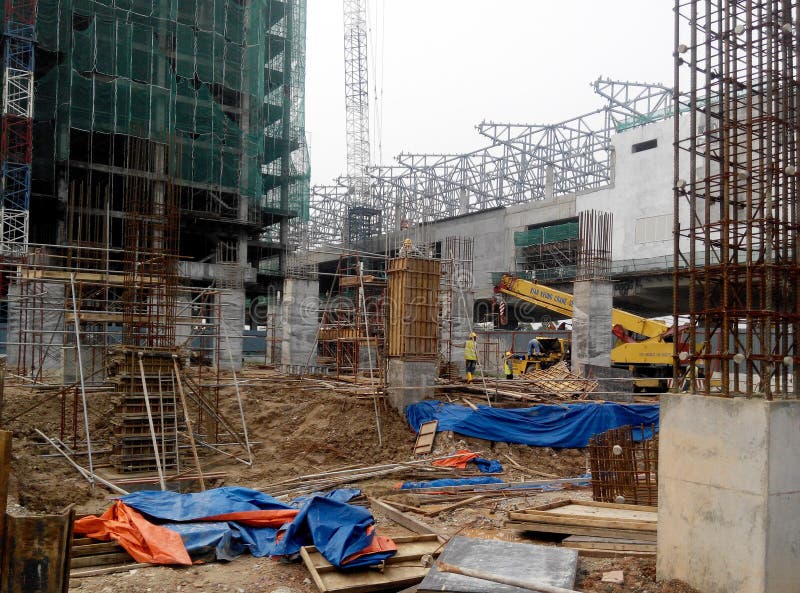 Group of Construction Workers Working at the Construction Site. the ...