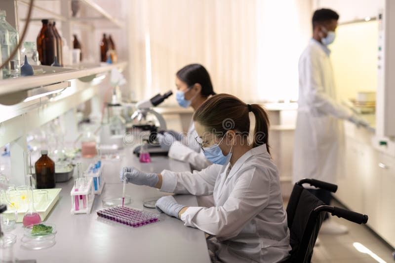 Group of Contemporary Scientists Working in Lab Stock Photo - Image of ...
