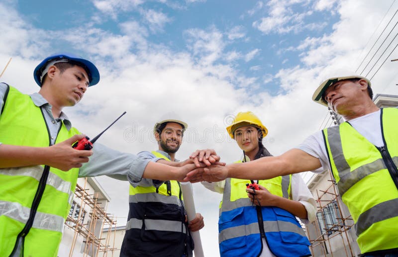 Group of Contractors, Engineers and Formats in Safety Vests with ...